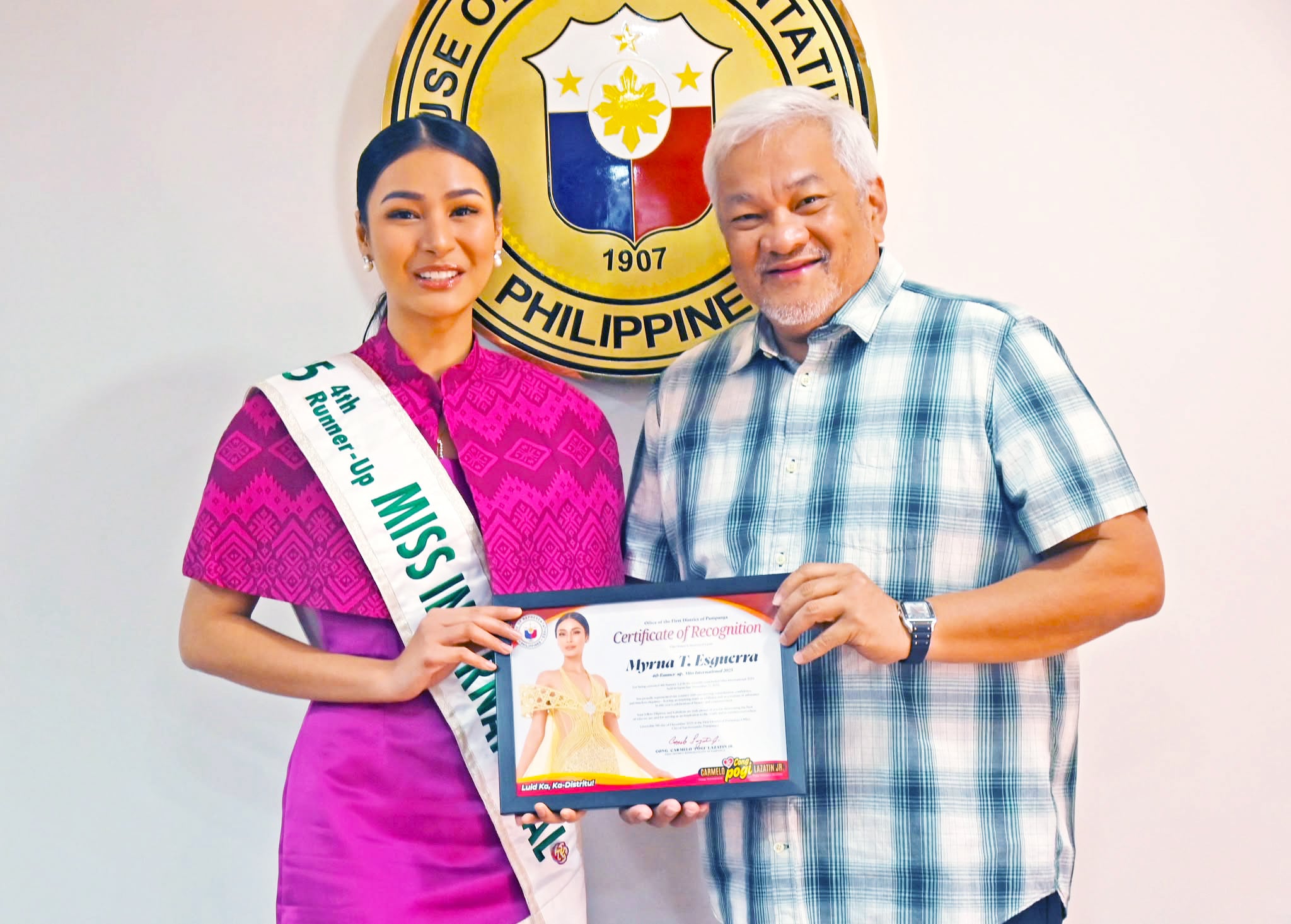 Cong Pogi presents certificate of recognition to Myrna Esguerra ...
